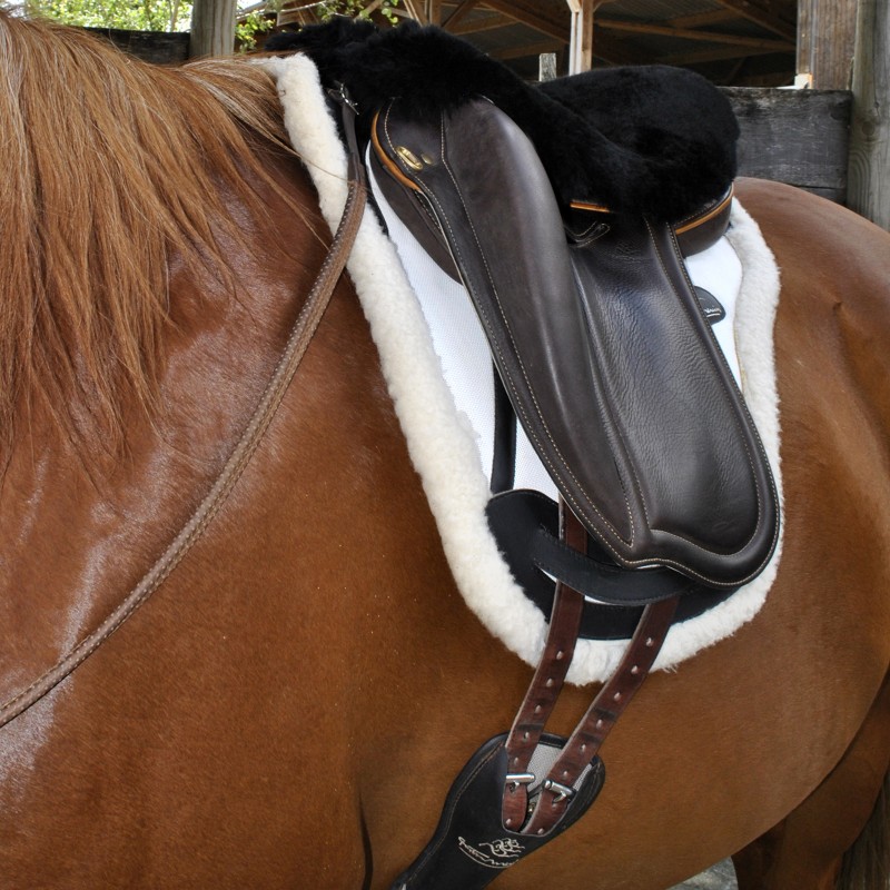 Saddle over seat in natural sheepskin
